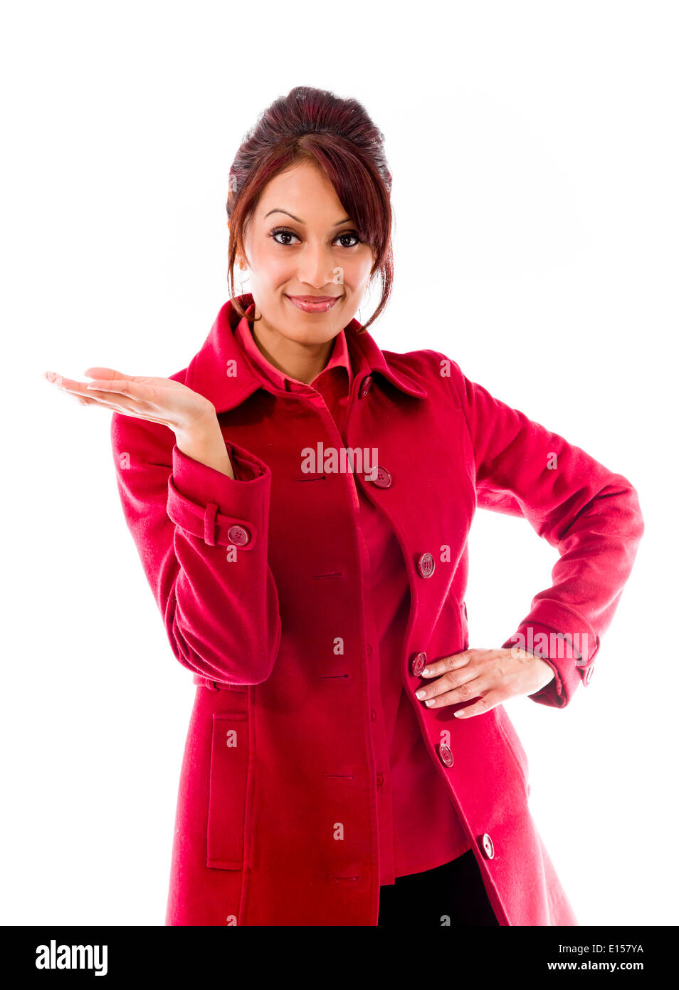 Indian young woman showing product with open hand palm Stock Photo - Alamy
