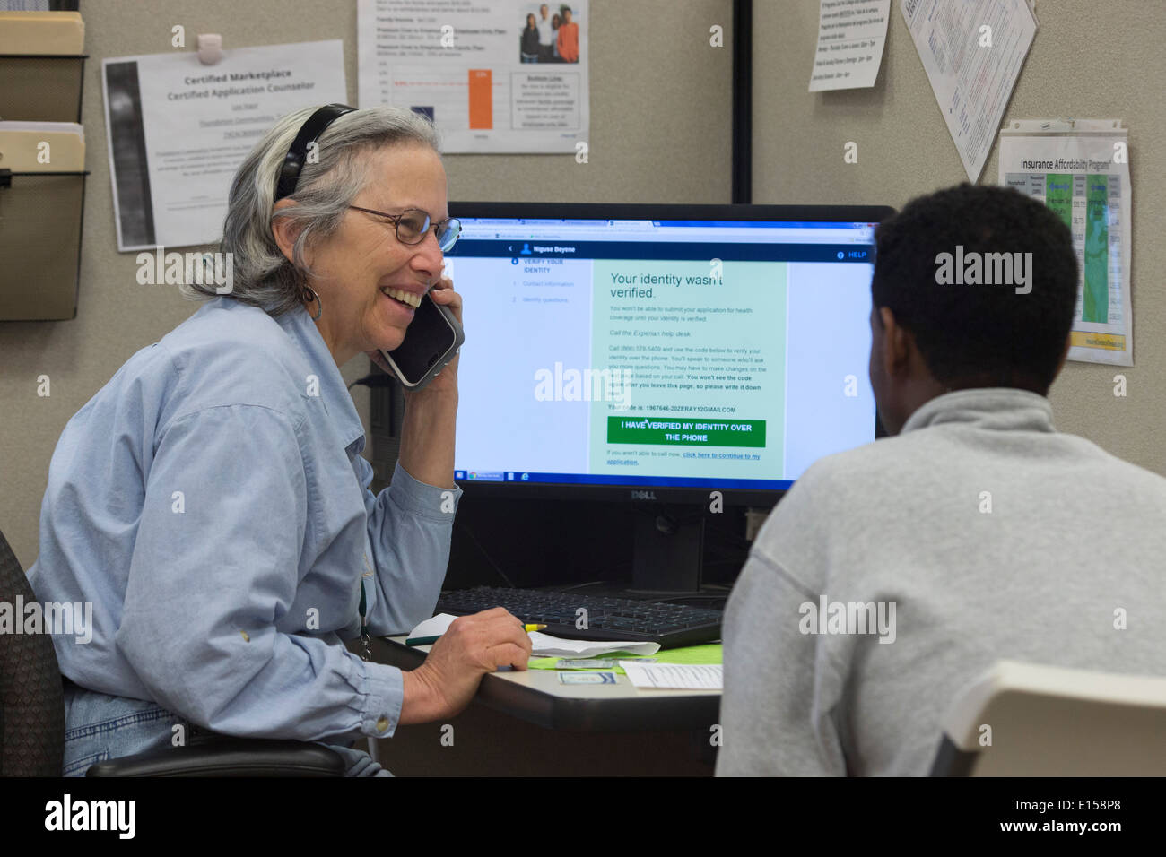 Community volunteer for local nonprofit group signs up client for ...
