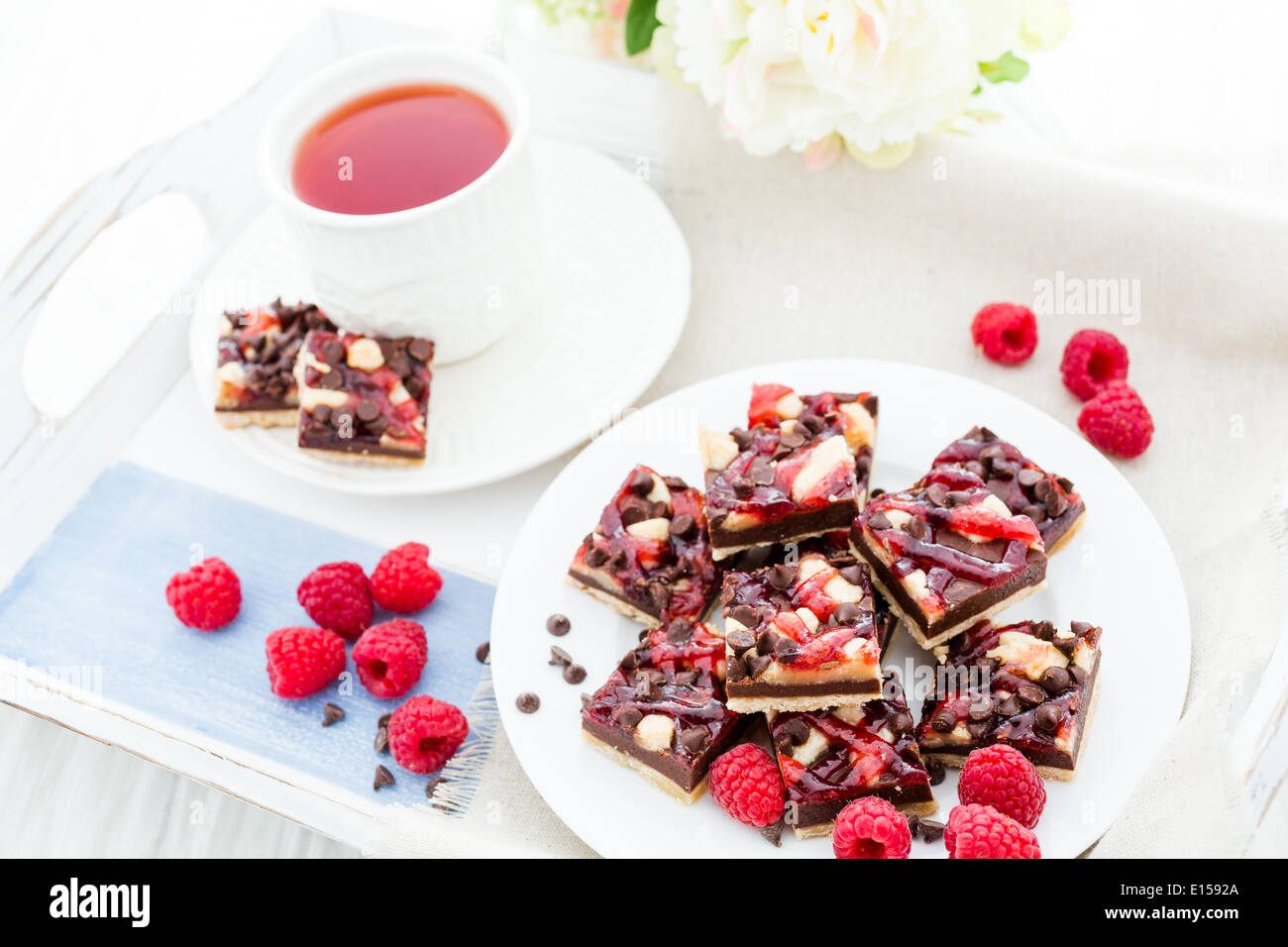 Fresh chocolate raspberry squares cut in bite size Stock Photo - Alamy