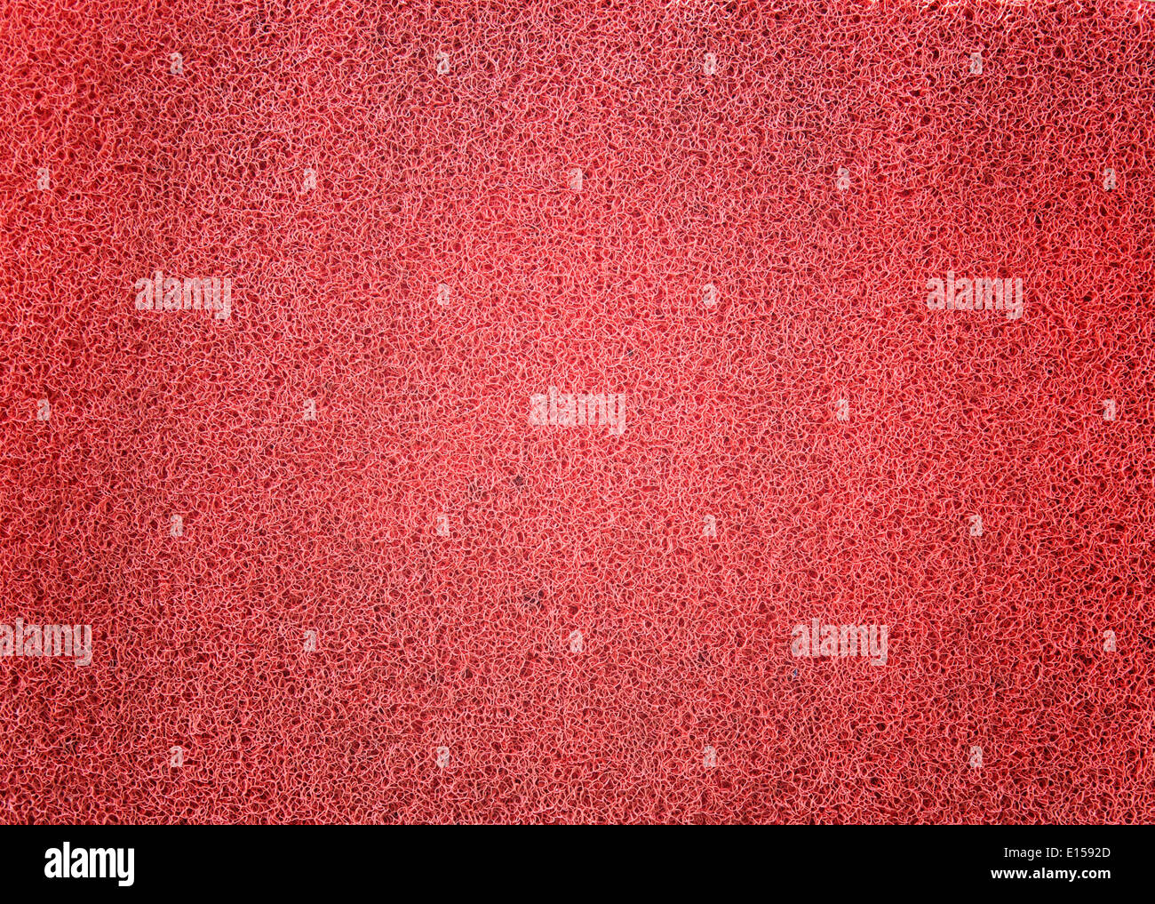 Red background A small cloth to remove dust Stock Photo - Alamy