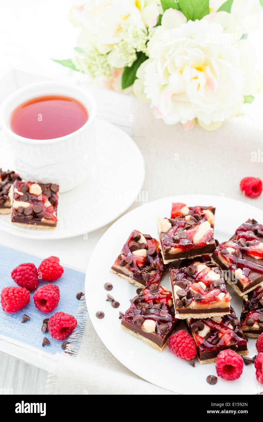 Fresh chocolate raspberry squares cut in bite size Stock Photo - Alamy