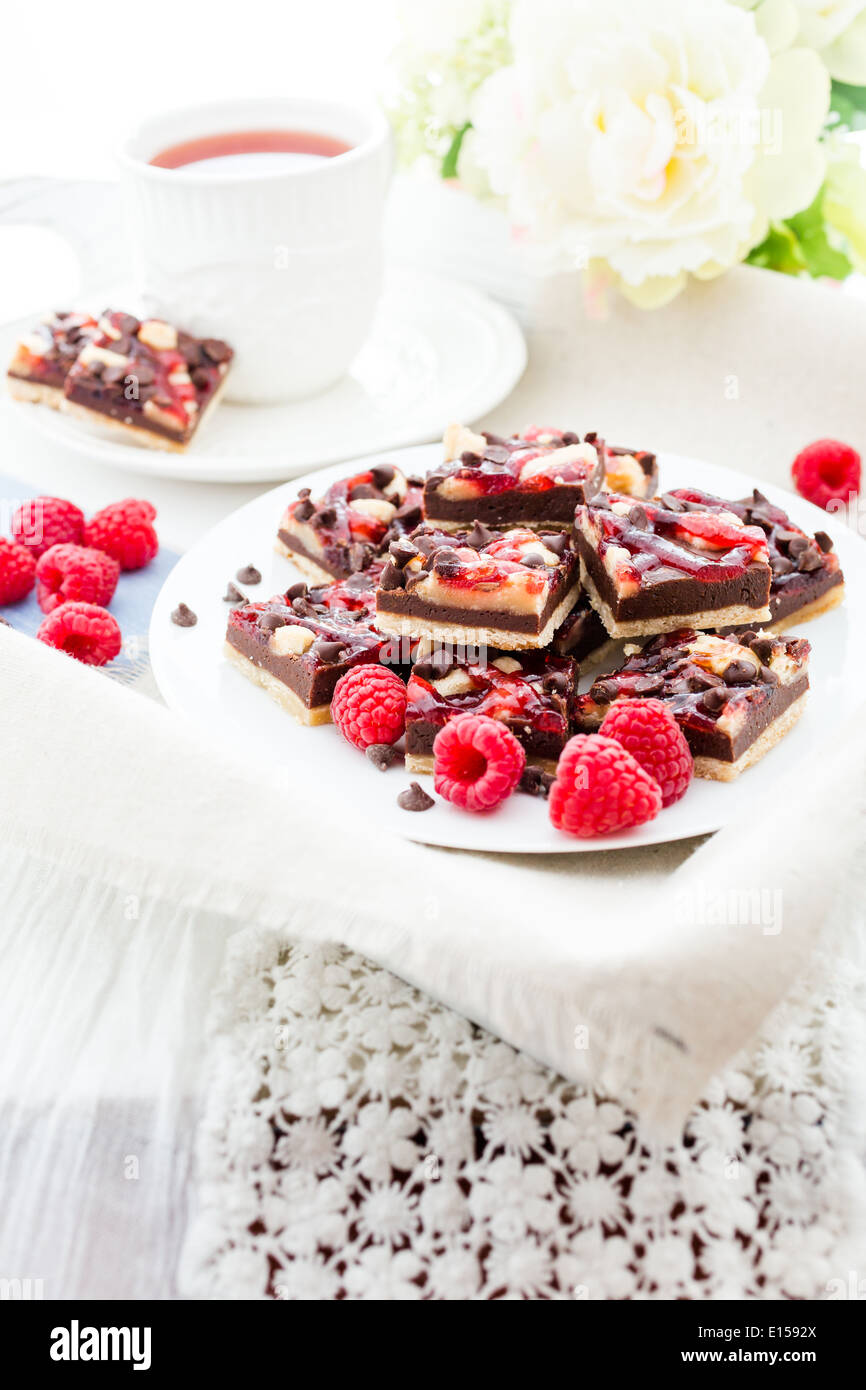 Fresh chocolate raspberry squares cut in bite size Stock Photo - Alamy