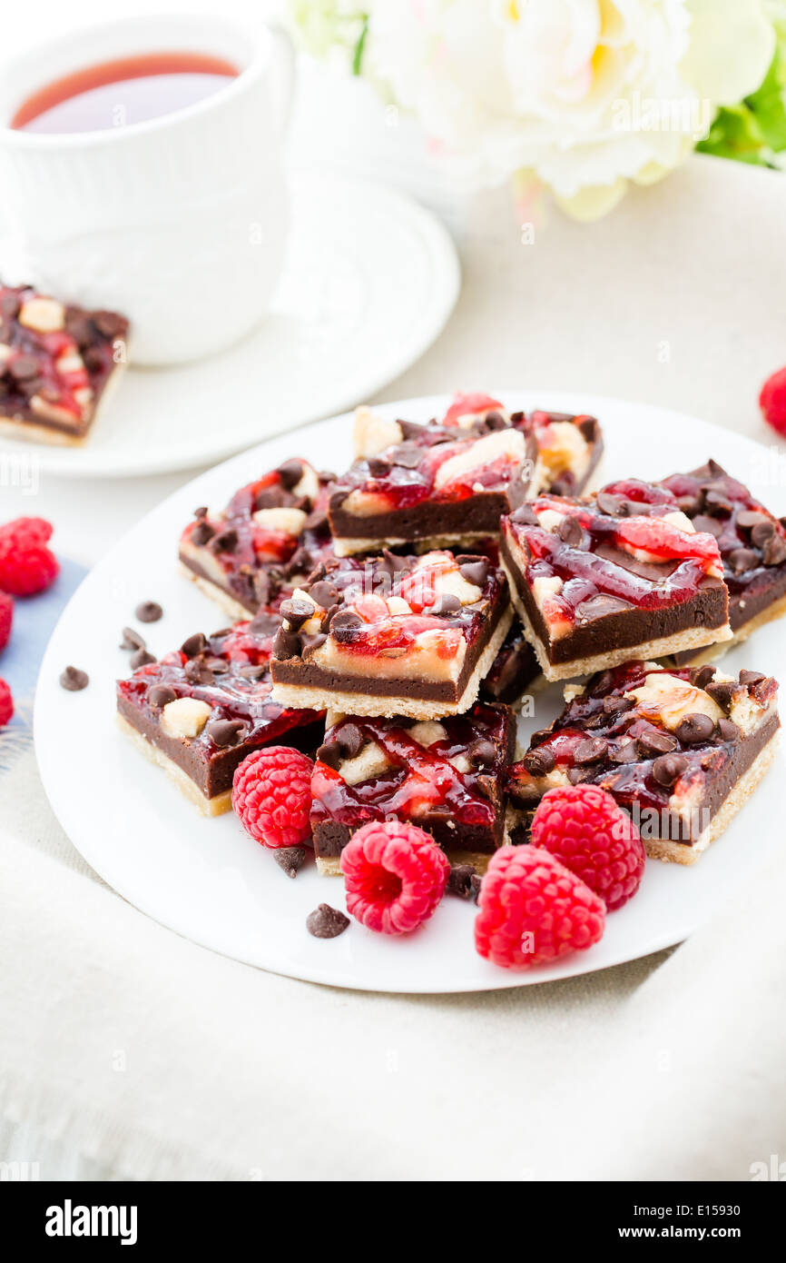 Fresh chocolate raspberry squares cut in bite size Stock Photo - Alamy