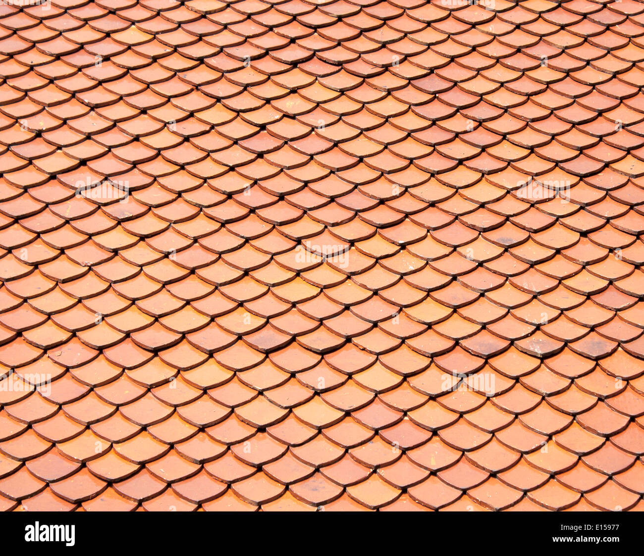 Roof tiles background tiles sun protection construction Stock Photo - Alamy