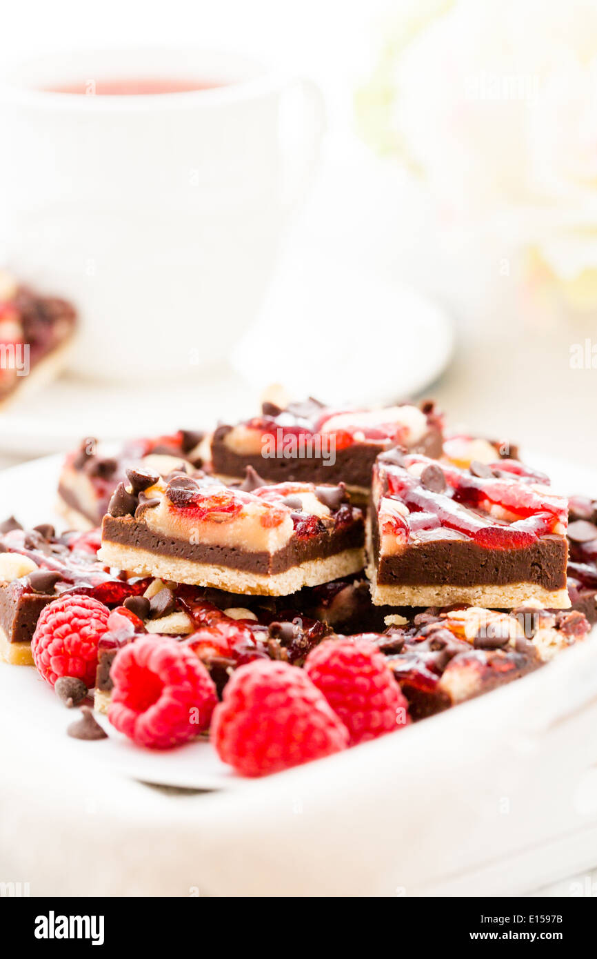Fresh chocolate raspberry squares cut in bite size Stock Photo - Alamy