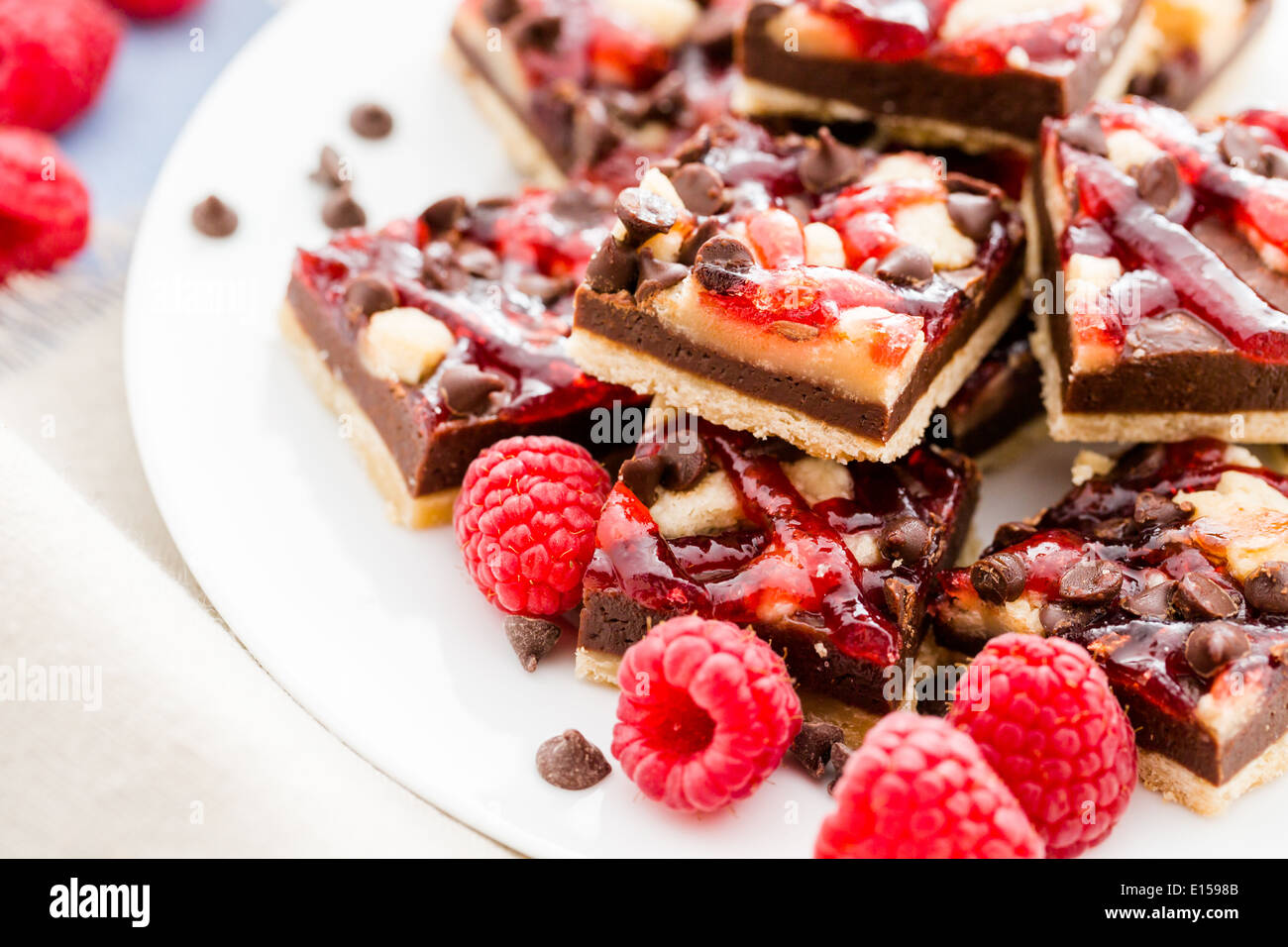 Fresh chocolate raspberry squares cut in bite size Stock Photo - Alamy