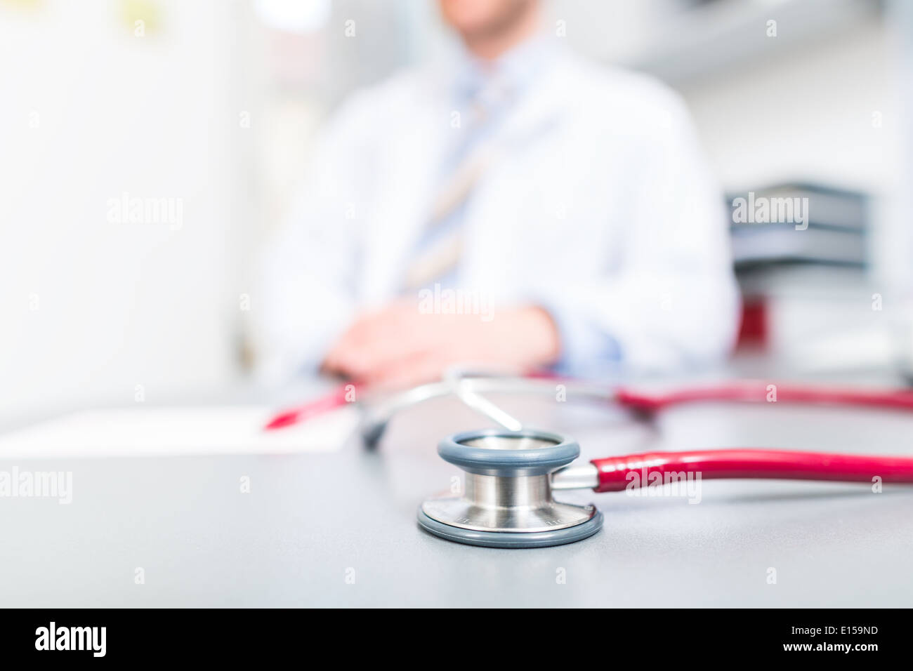 Doctor sitting practice hi-res stock photography and images - Alamy