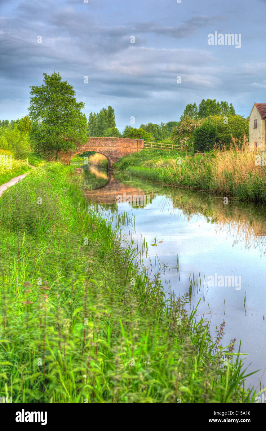Bridge over river in England an English country scene in colourful ...