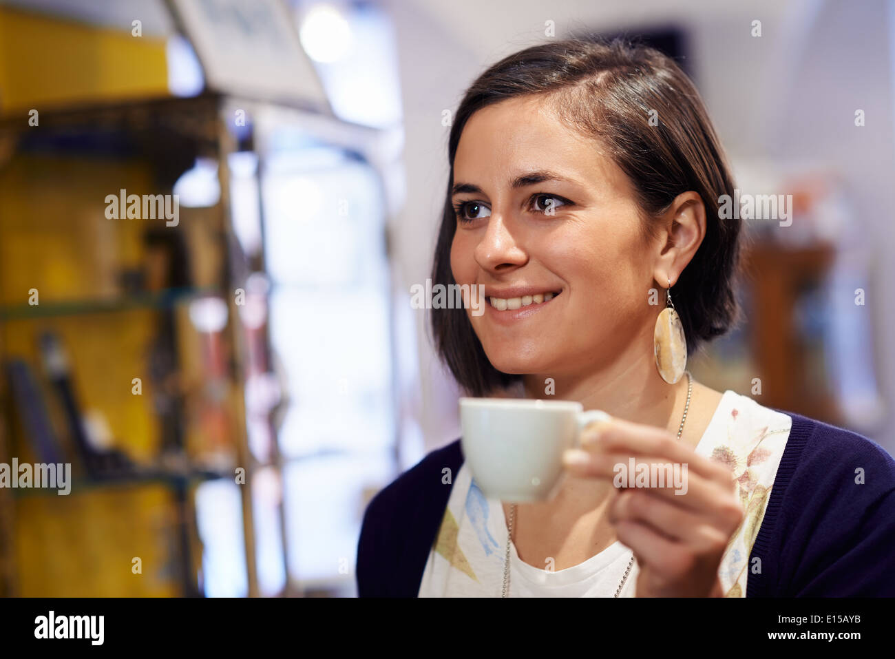 Woman drinking espresso coffee hi-res stock photography and images - Alamy
