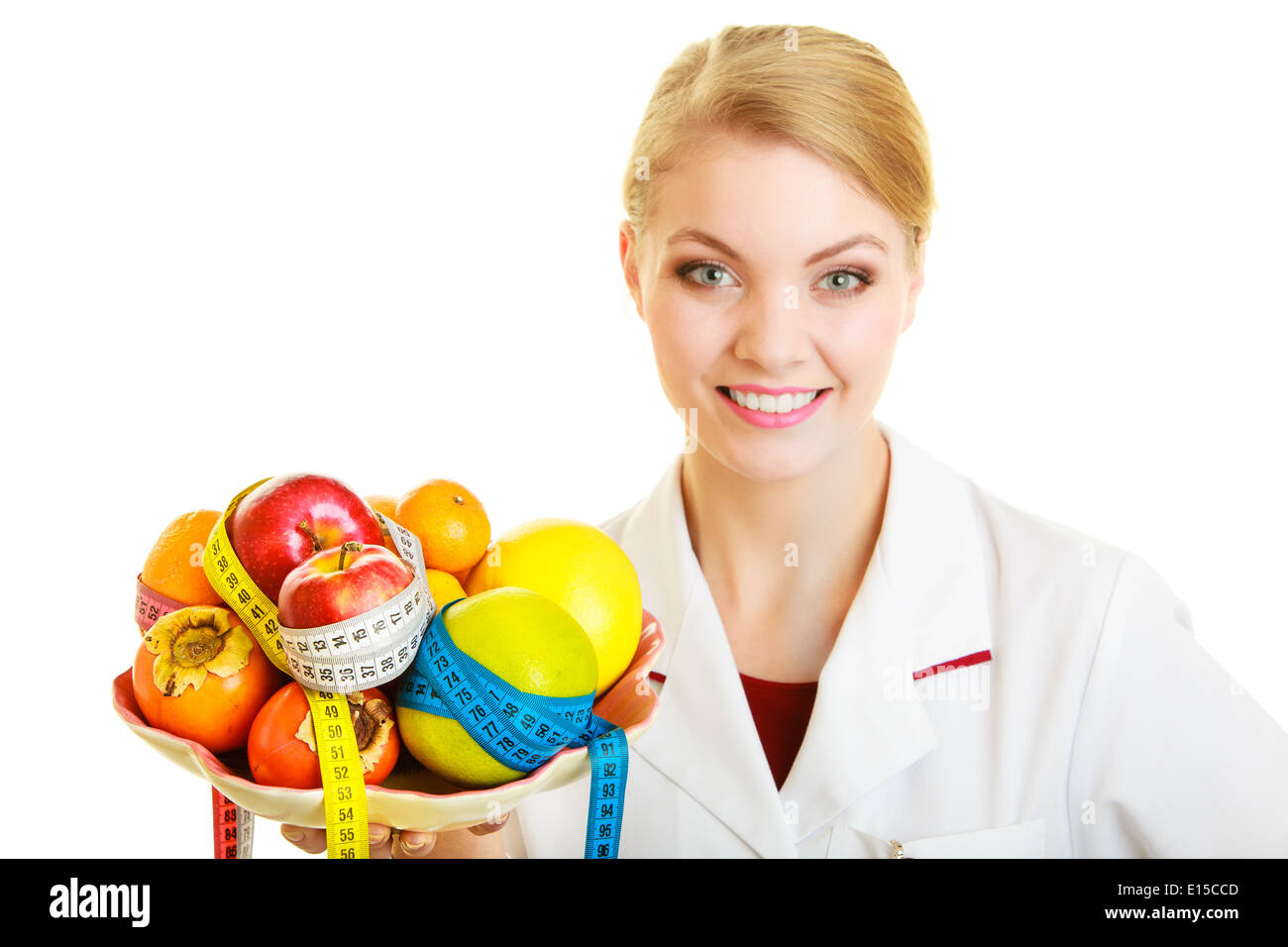 Woman doctor dietitian in lab coat recommending healthy food. Diet ...