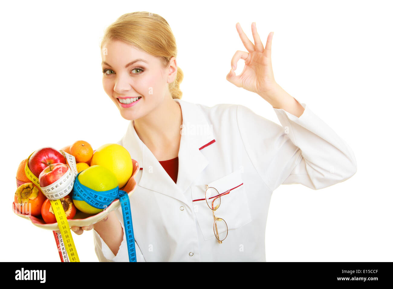Woman doctor dietitian in lab coat recommending healthy food. Diet ...
