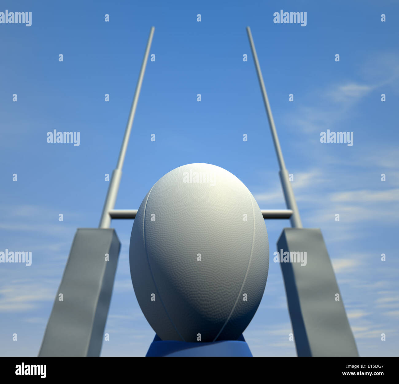 A perspective view of a plain white rugby ball on a blue kicking tee in ...