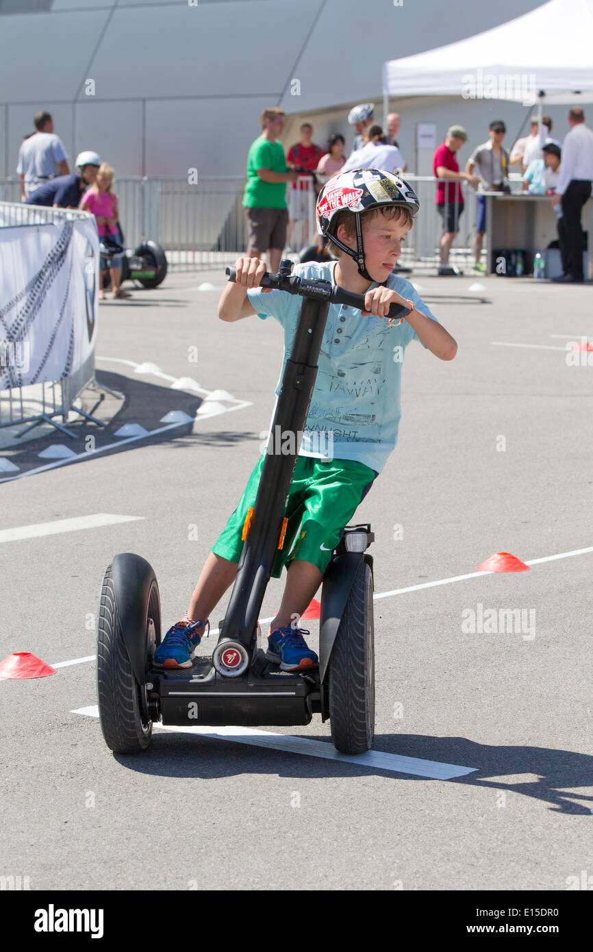 Child segway hi-res stock photography and images - Alamy