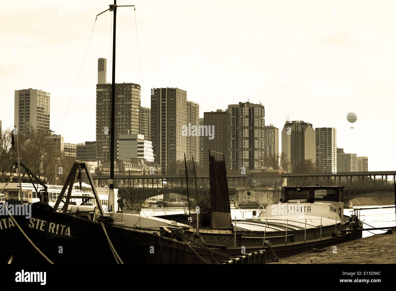France, Paris, cargo ship in front of high-rise multi-family houses ...