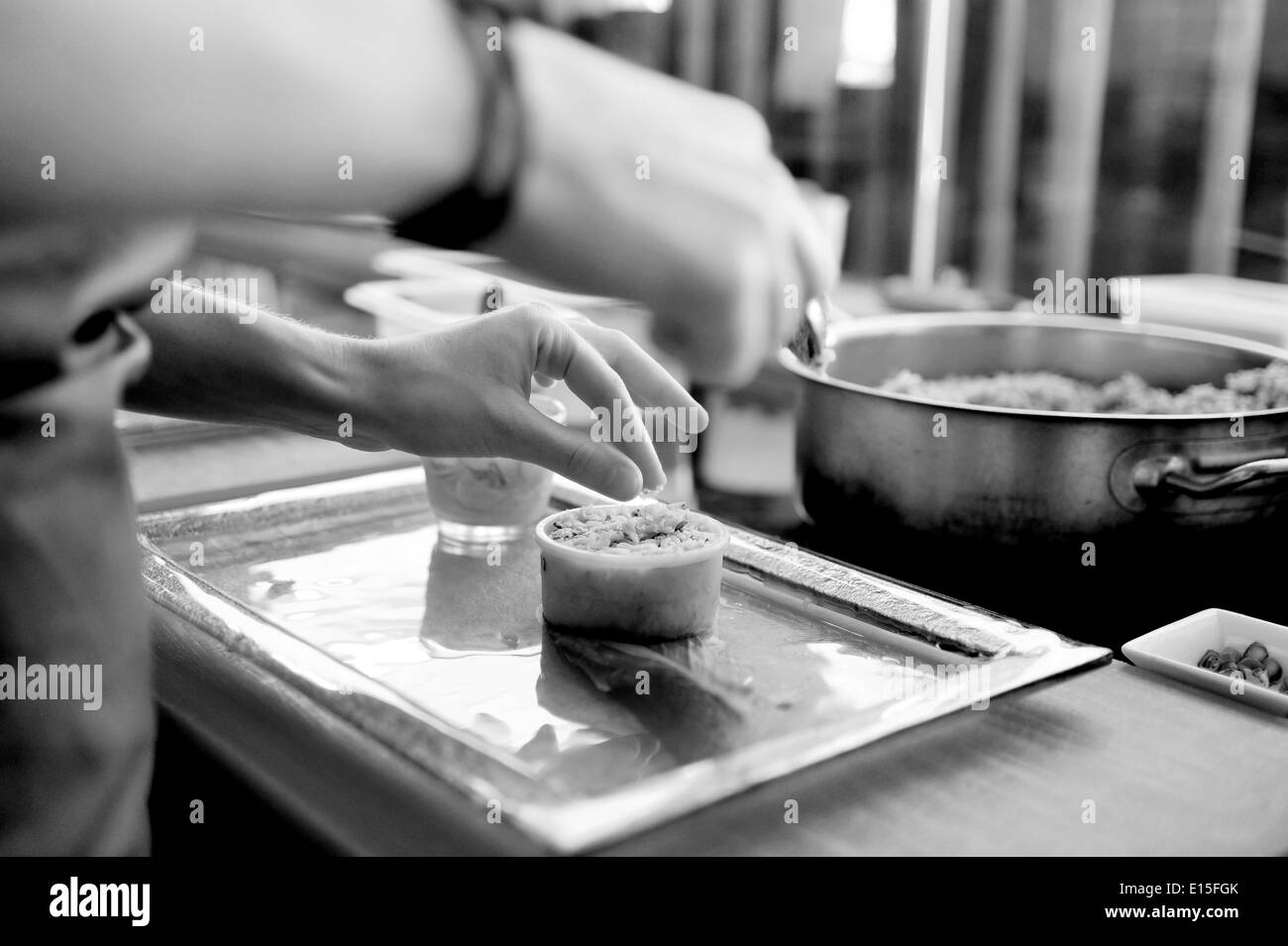 Cooking and molding rice before serving Stock Photo - Alamy