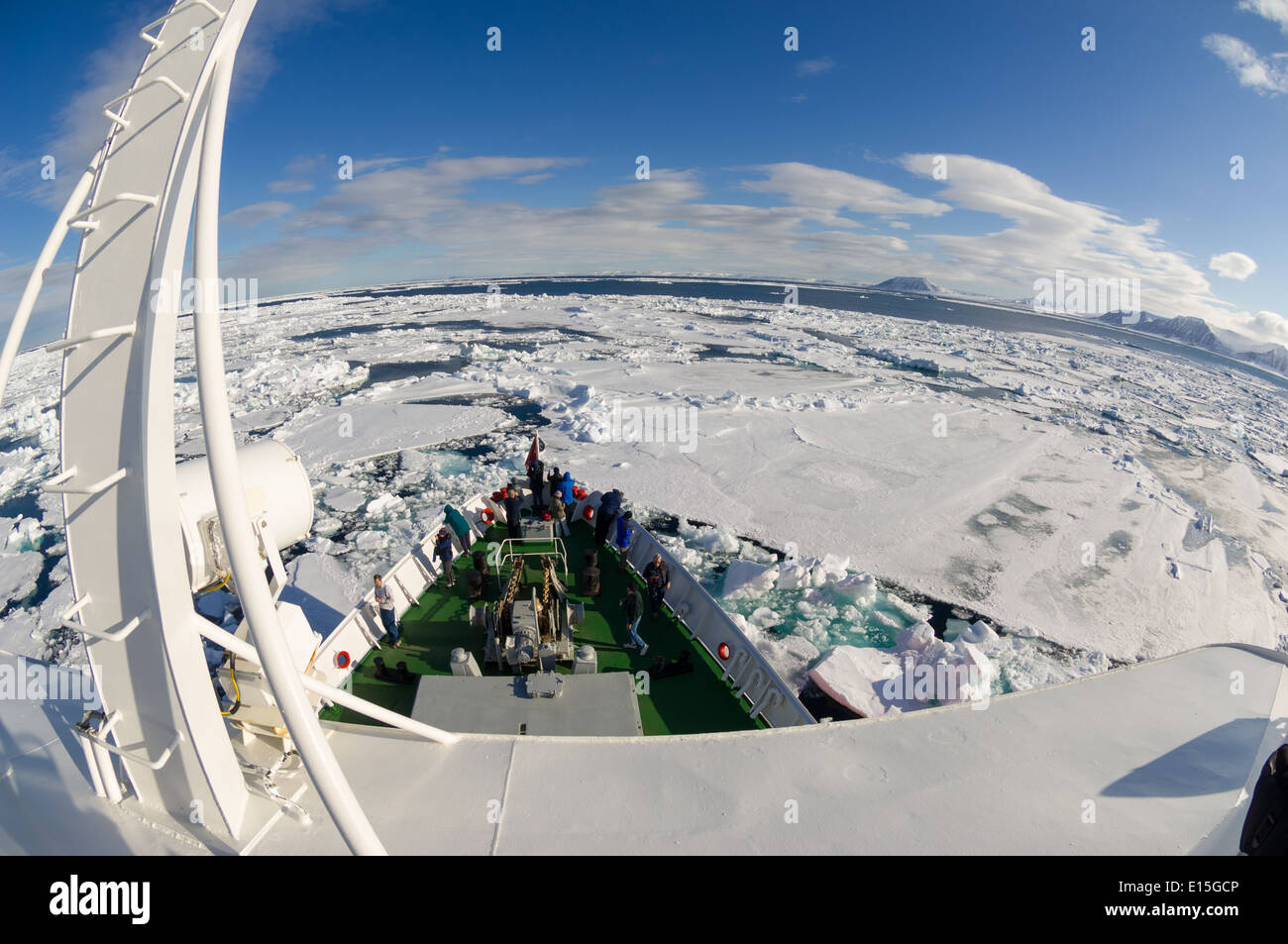 Fisheye shot of passengers on the prow icebreaker expedition ship ...