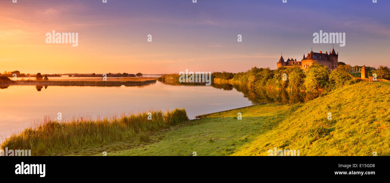 Panorama of a medieval castle at sunrise Stock Photo - Alamy