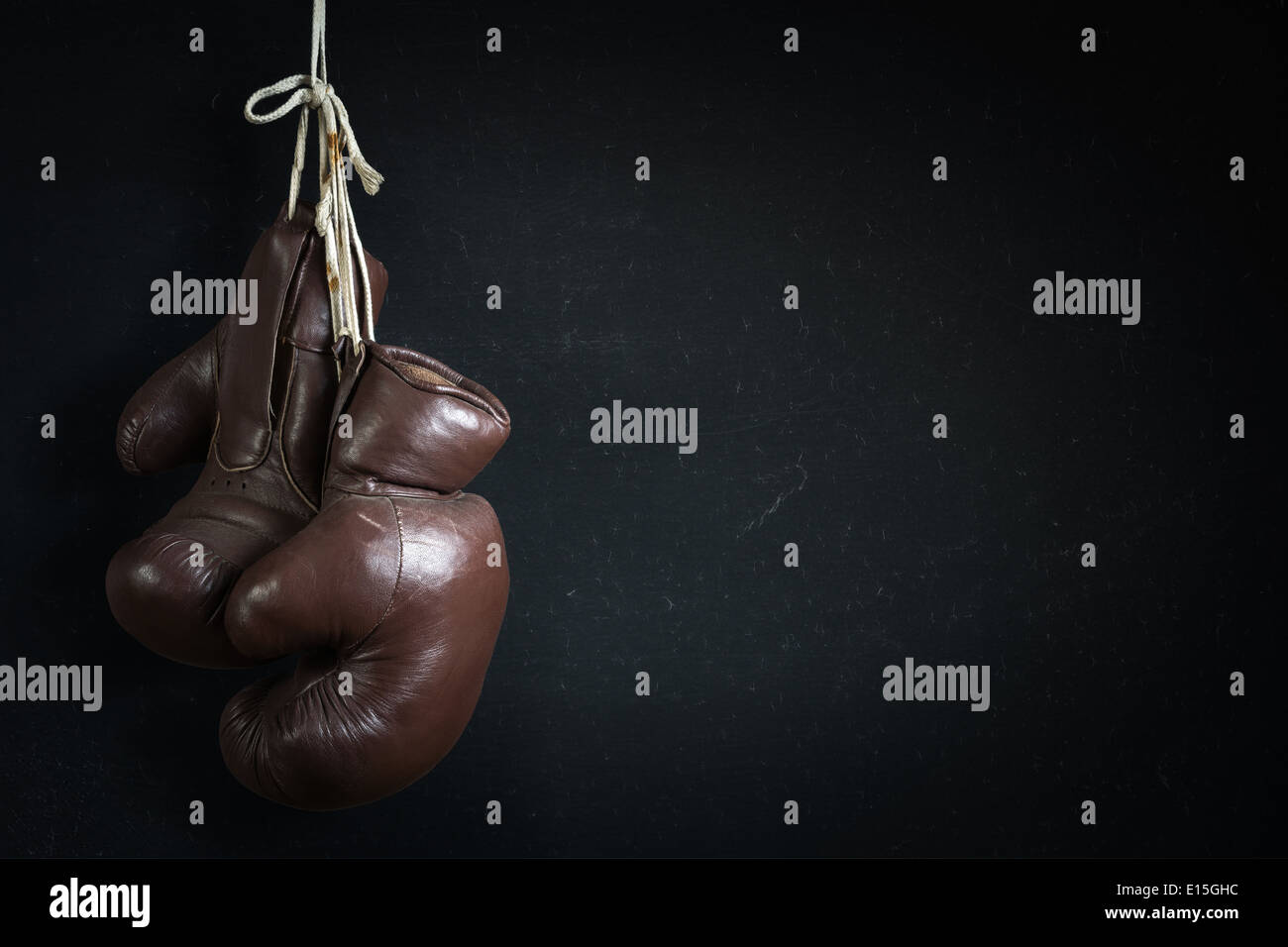old used boxing Gloves, hanging before a Chalk Board Stock Photo - Alamy