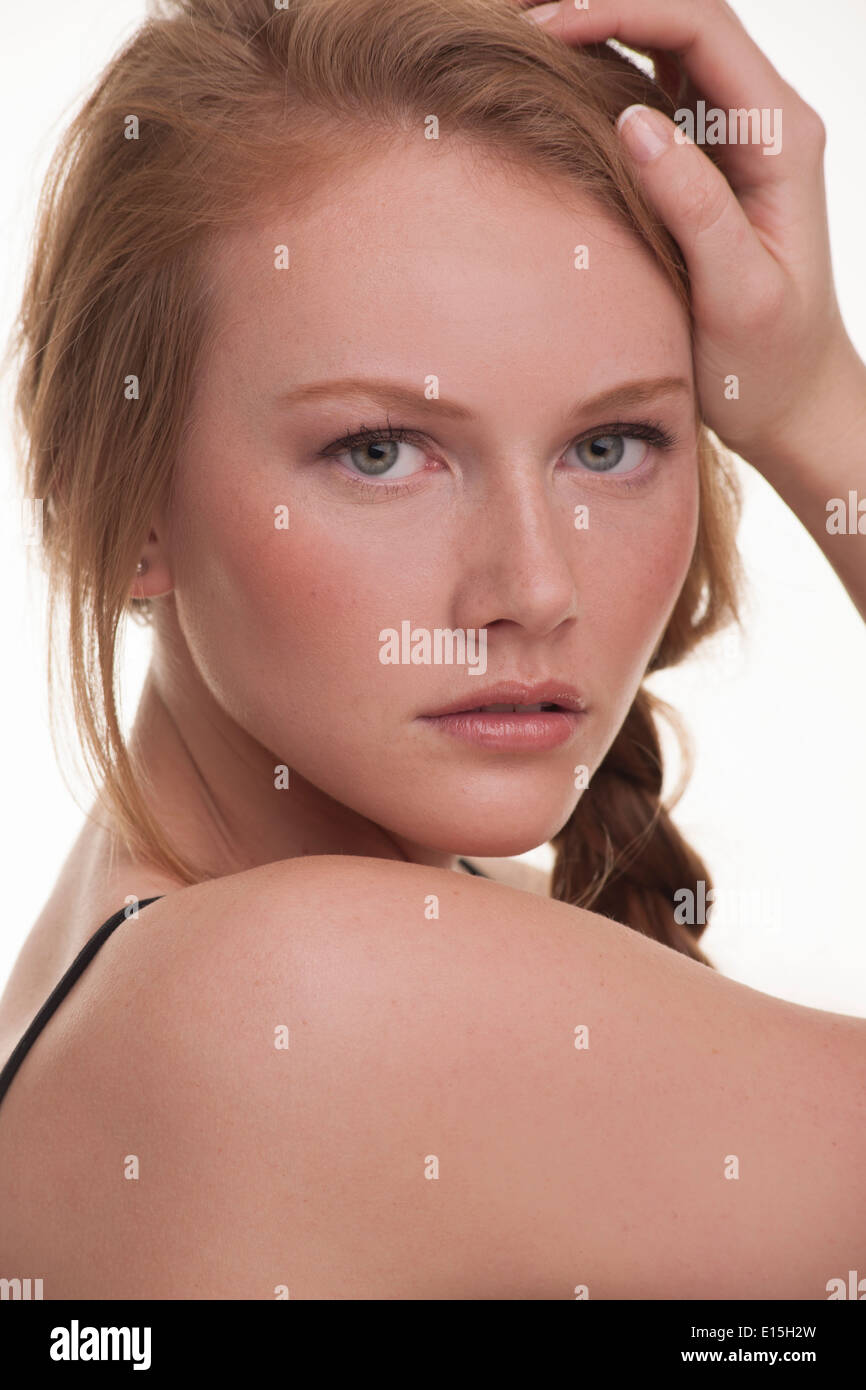 girl with hand on head Stock Photo - Alamy