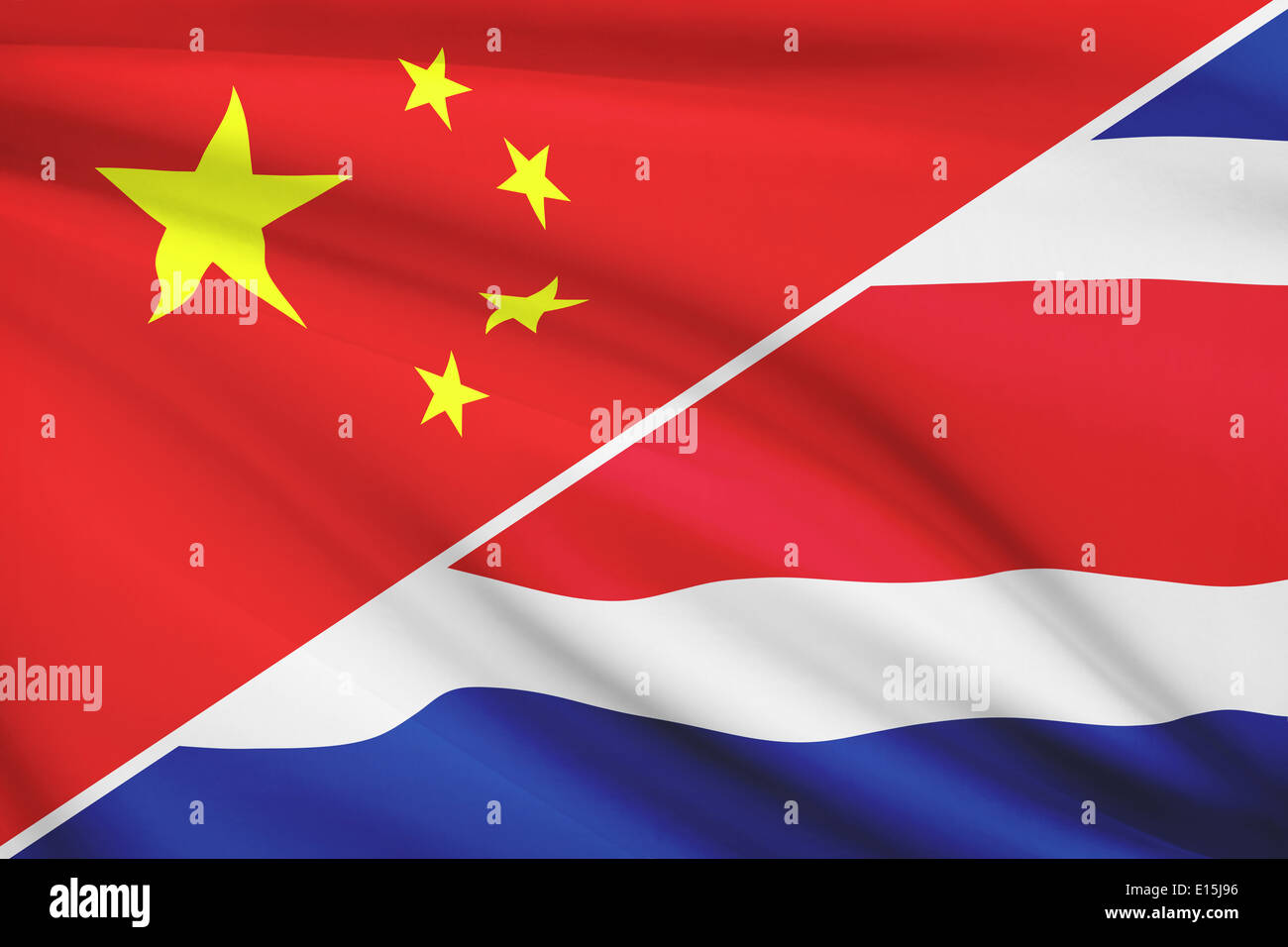 Flags of China and Republic of Costa Rica blowing in the wind. Part of ...