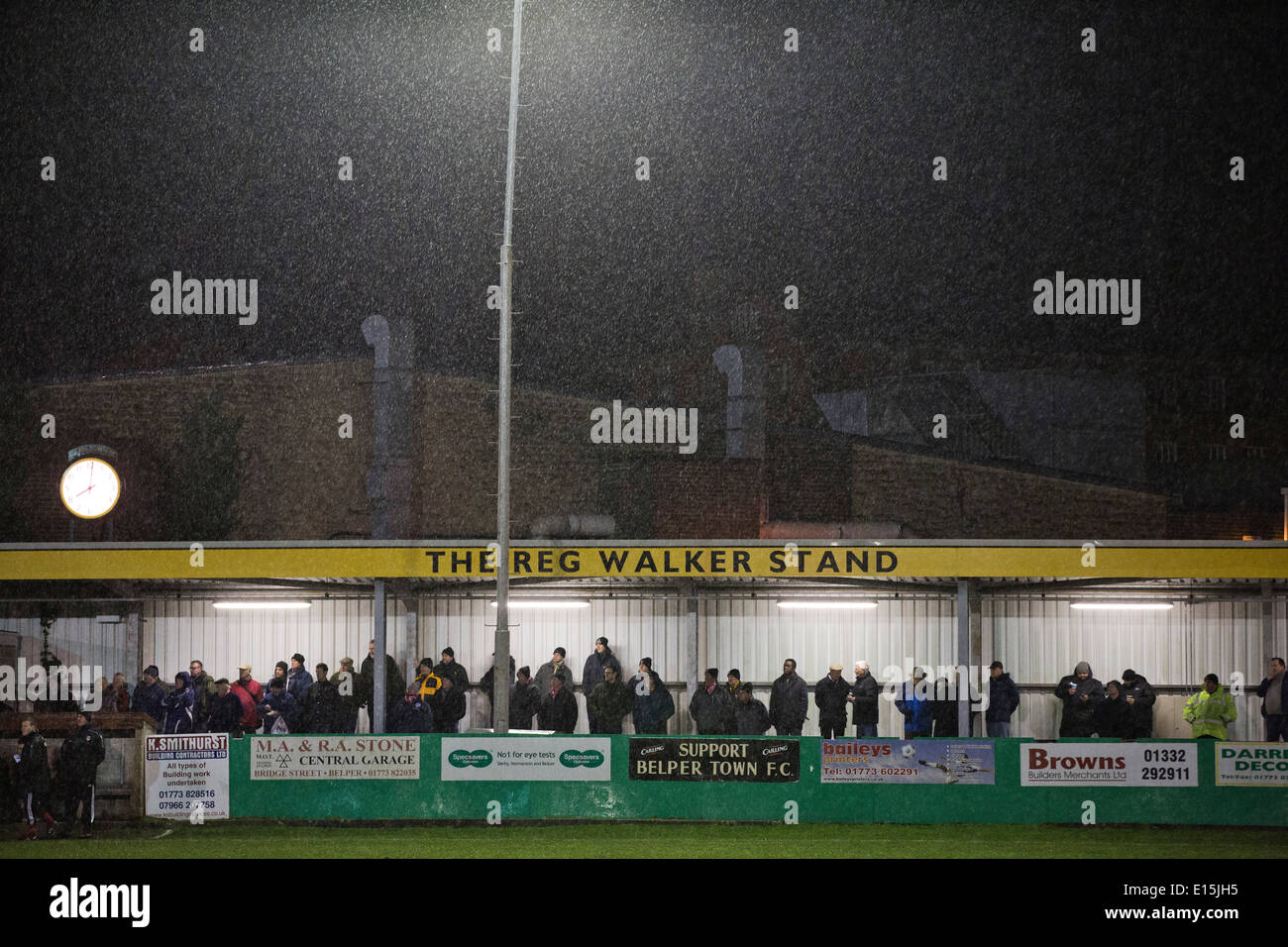 Spectators sheltering from the rain in the Reg Walker stand during the ...