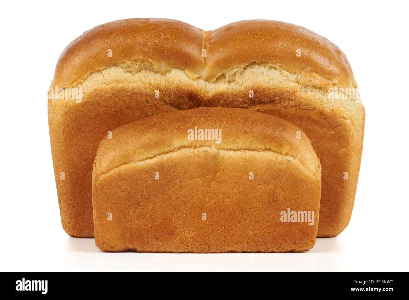 Two loaves of grain bread isolated on white background Stock Photo - Alamy