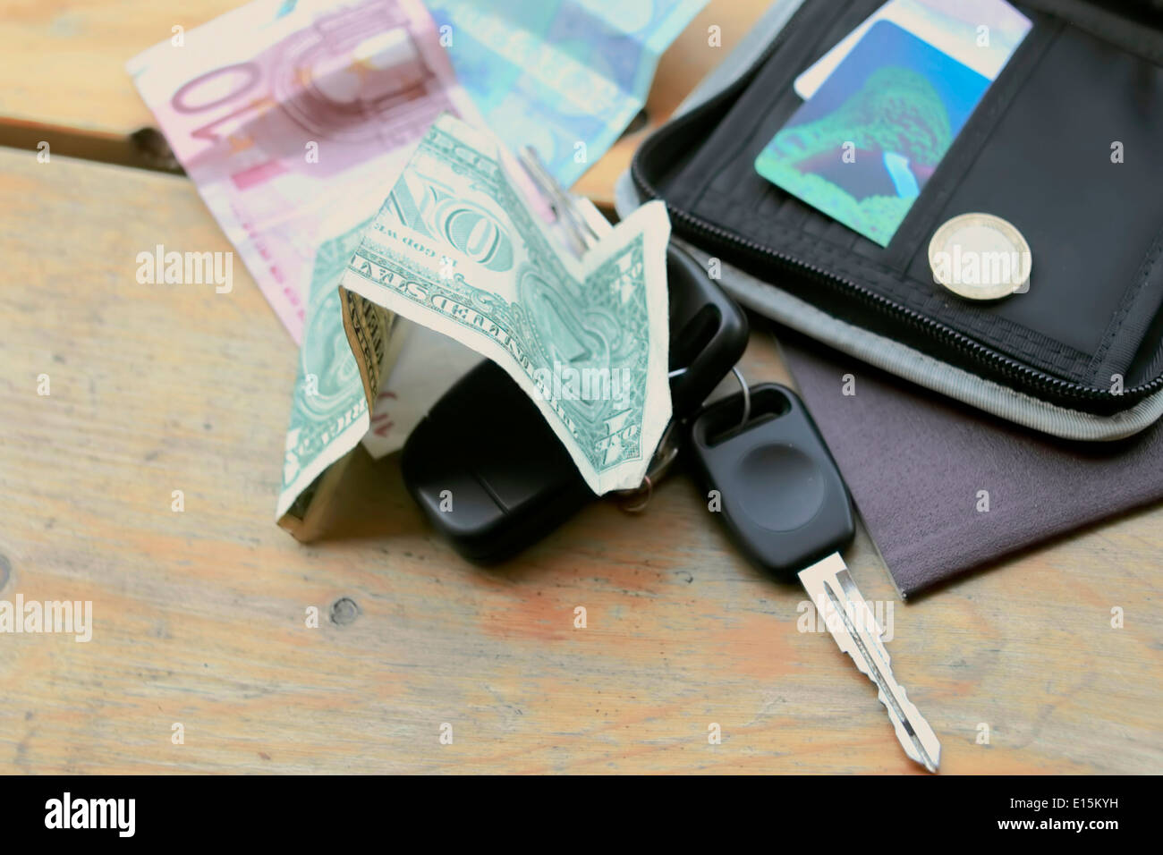 Ignition keys, some cash, passport and usb connector Stock Photo - Alamy
