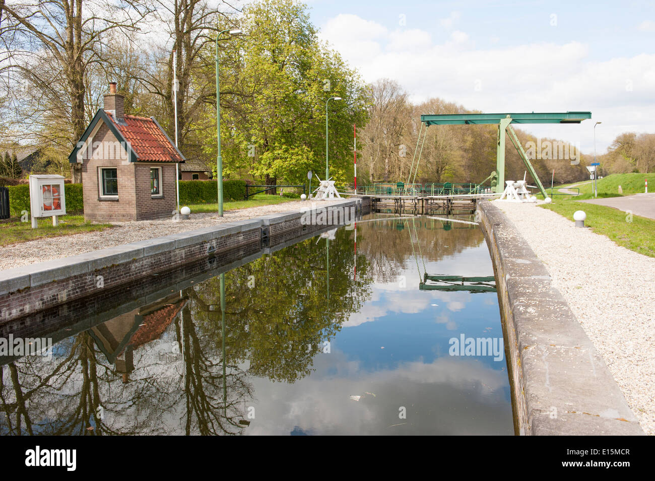 Filled lock chamber of sluice-gate with lift bridge in channel Stock ...