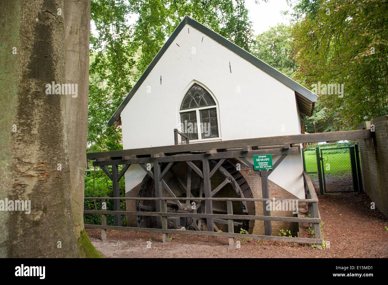 Traditional water mill with impeller in forest scenery Stock Photo - Alamy