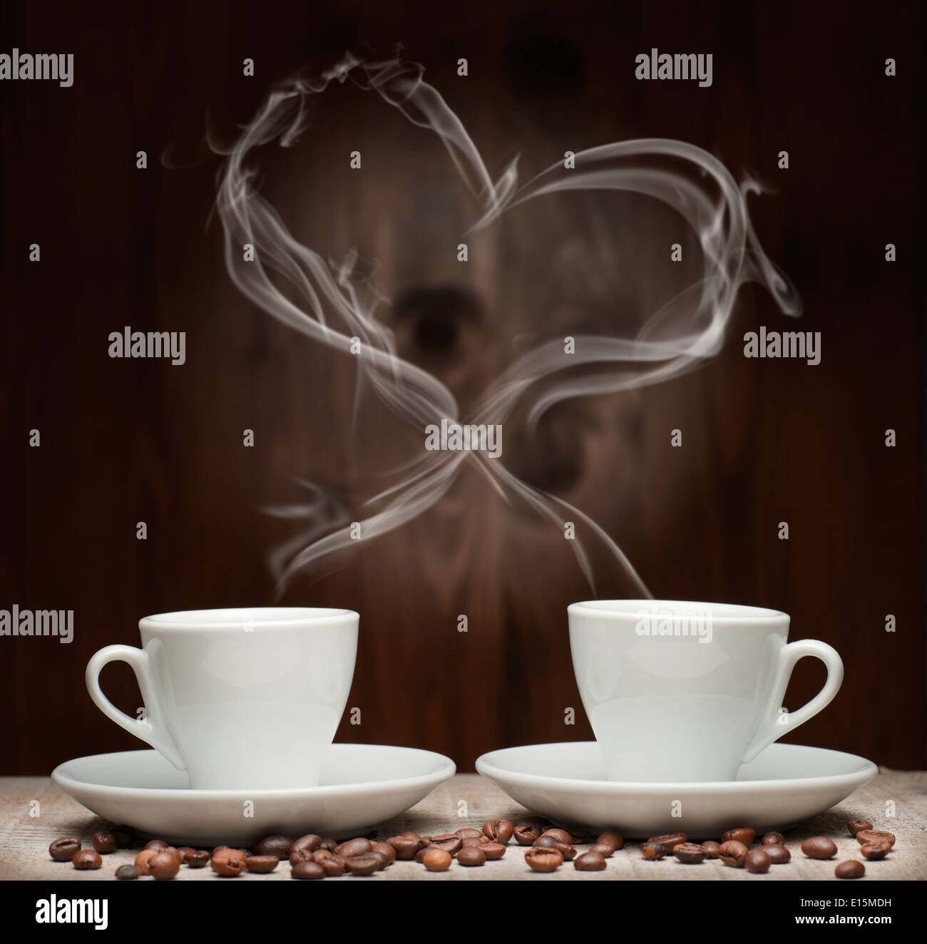 two cup of coffee with smoke shaped like a heart Stock Photo - Alamy