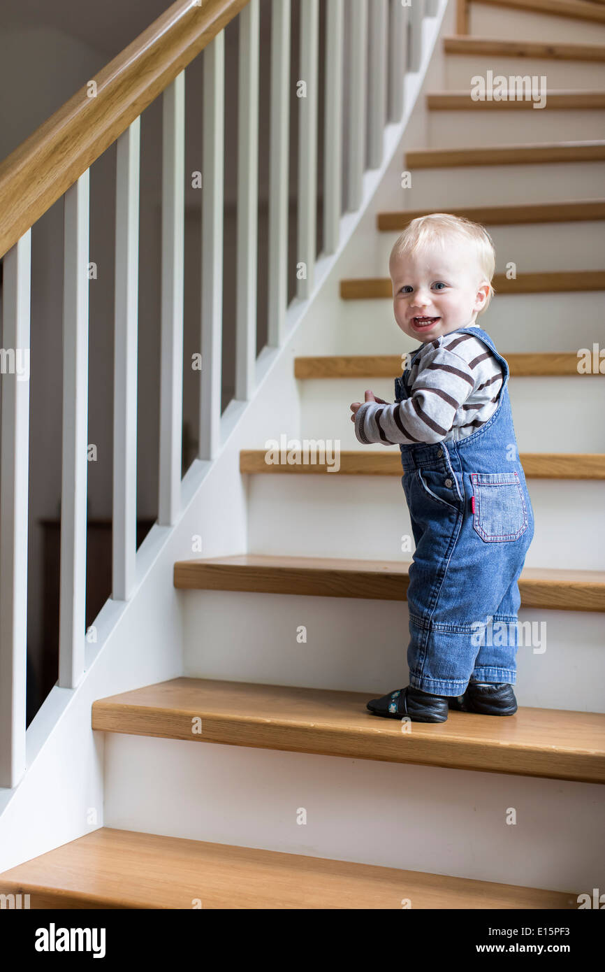 Child climbing stairs hi-res stock photography and images - Alamy