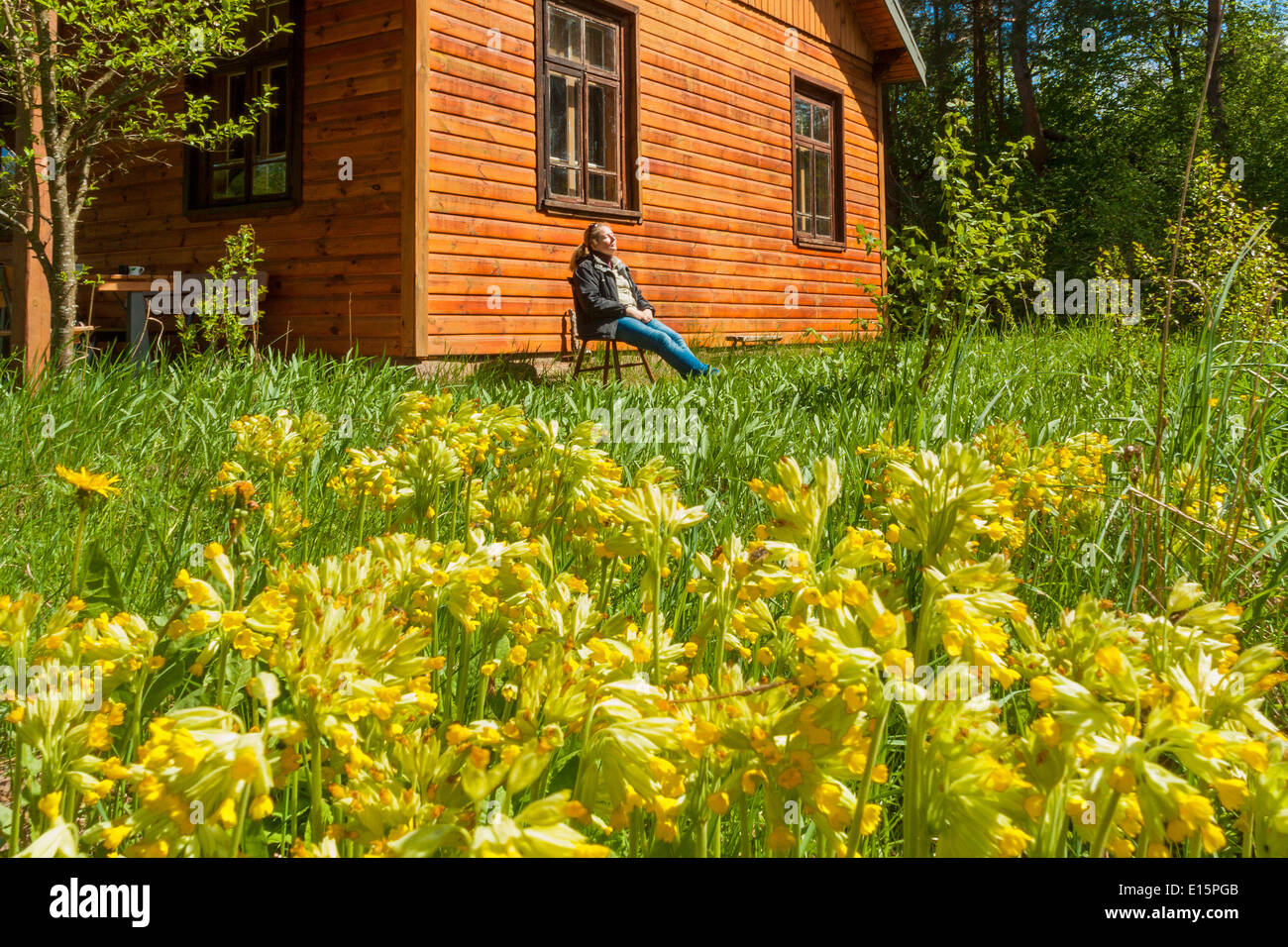 Woman basking in the sun hi-res stock photography and images - Alamy