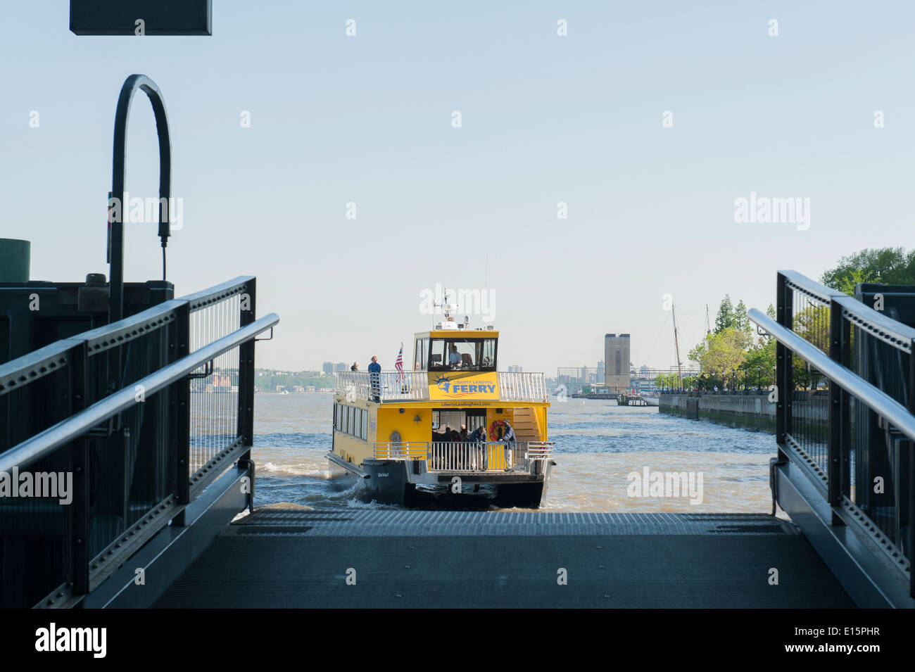 Hudson River ferry pulling into the terminal in Battery Park City, in ...
