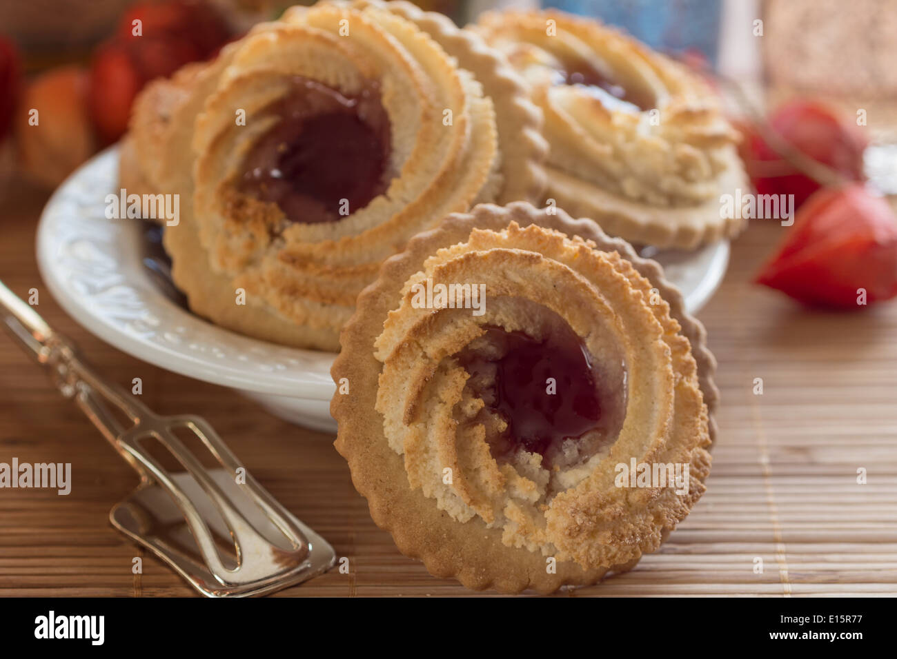 German Ox Eye cookies on a laid table Stock Photo - Alamy