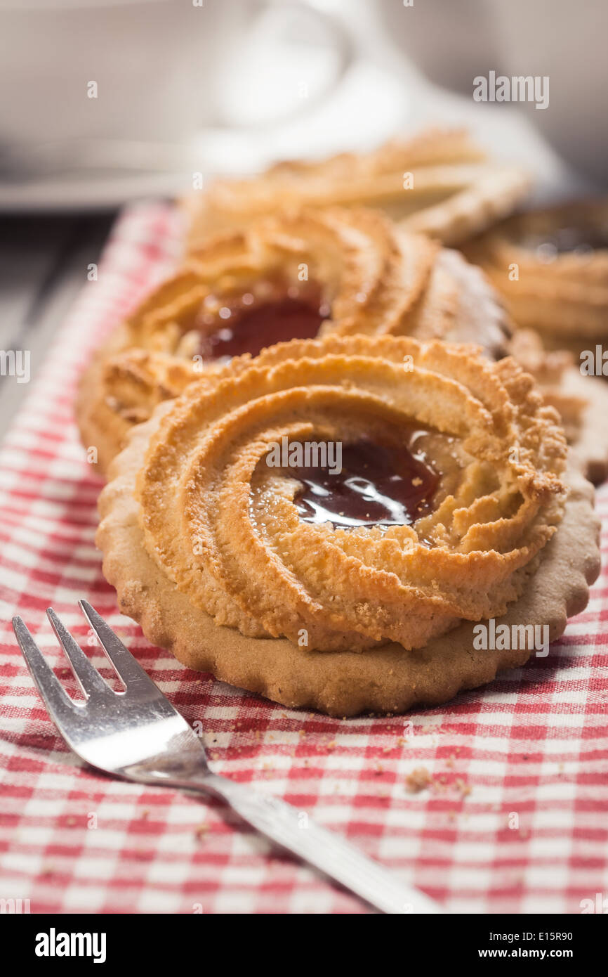 German Ox Eye cookies on a laid table Stock Photo - Alamy
