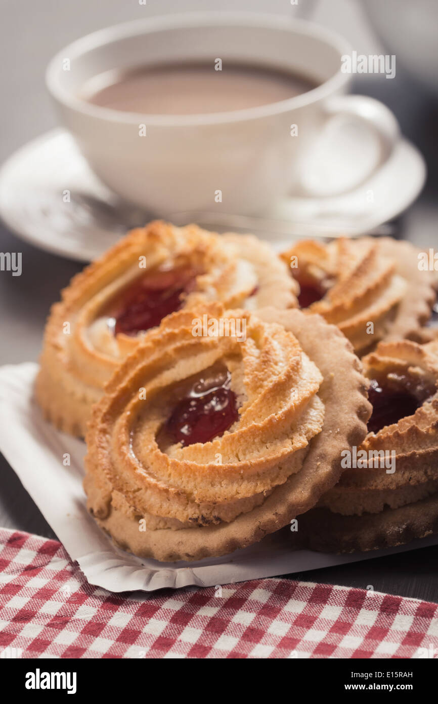 German Ox Eye cookies on a laid table Stock Photo - Alamy