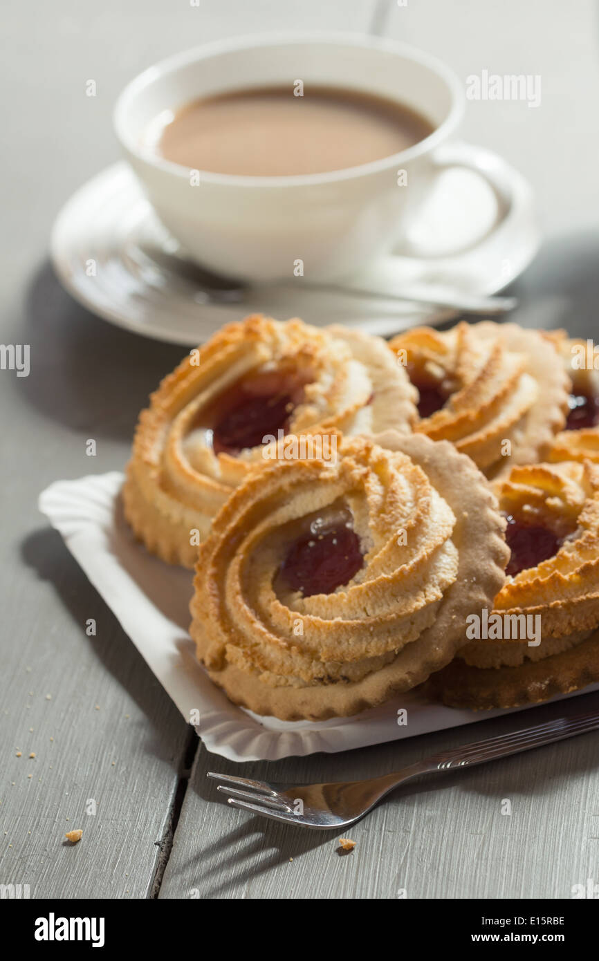 German Ox Eye cookies on a laid table Stock Photo - Alamy