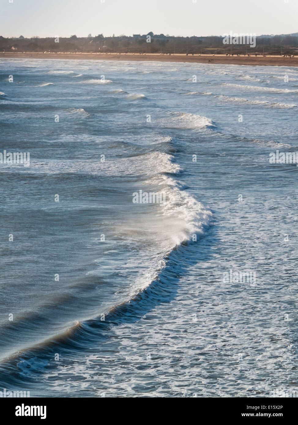 Incoming tide at Weymouth Stock Photo - Alamy