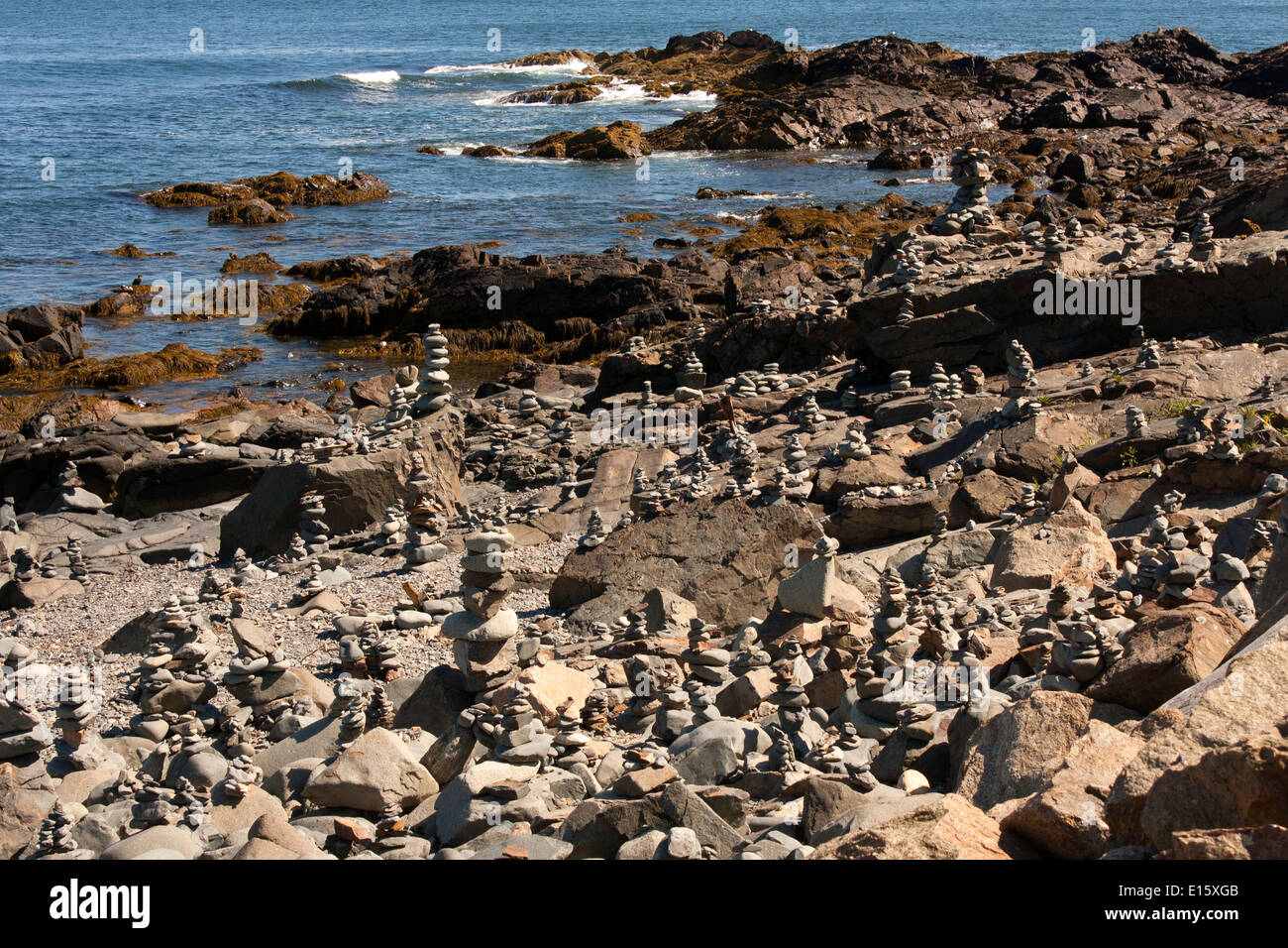 Ogunquit, Maine – September 4, 2013: Handmade rock piles are a common ...