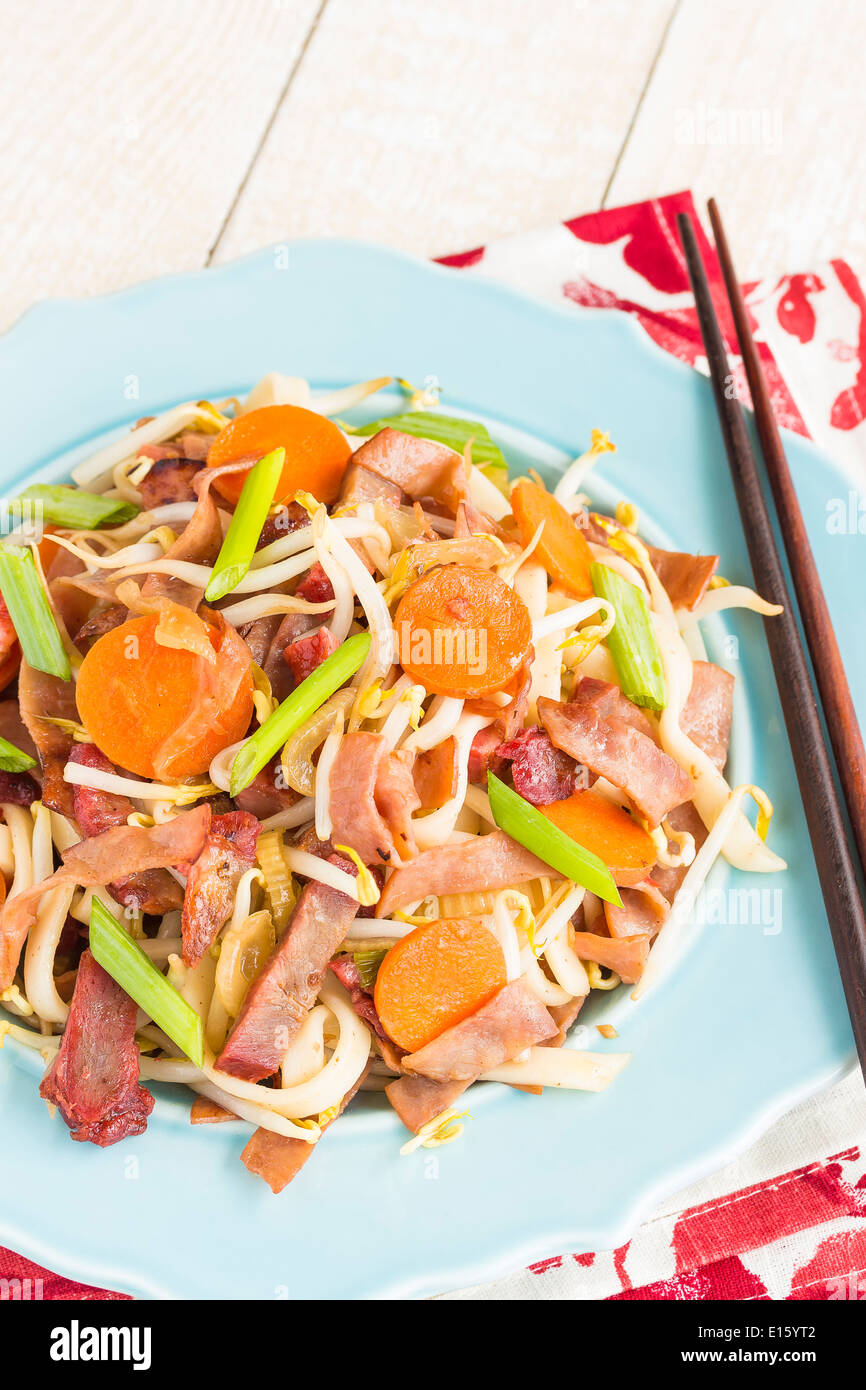Chow Funn noodles with sauteed ham, char siu pork and vegetables Stock ...