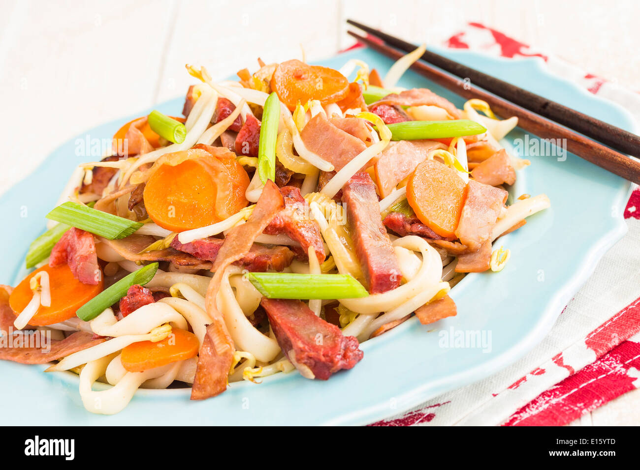 Chow Funn noodles with sauteed ham, char siu pork and vegetables Stock ...