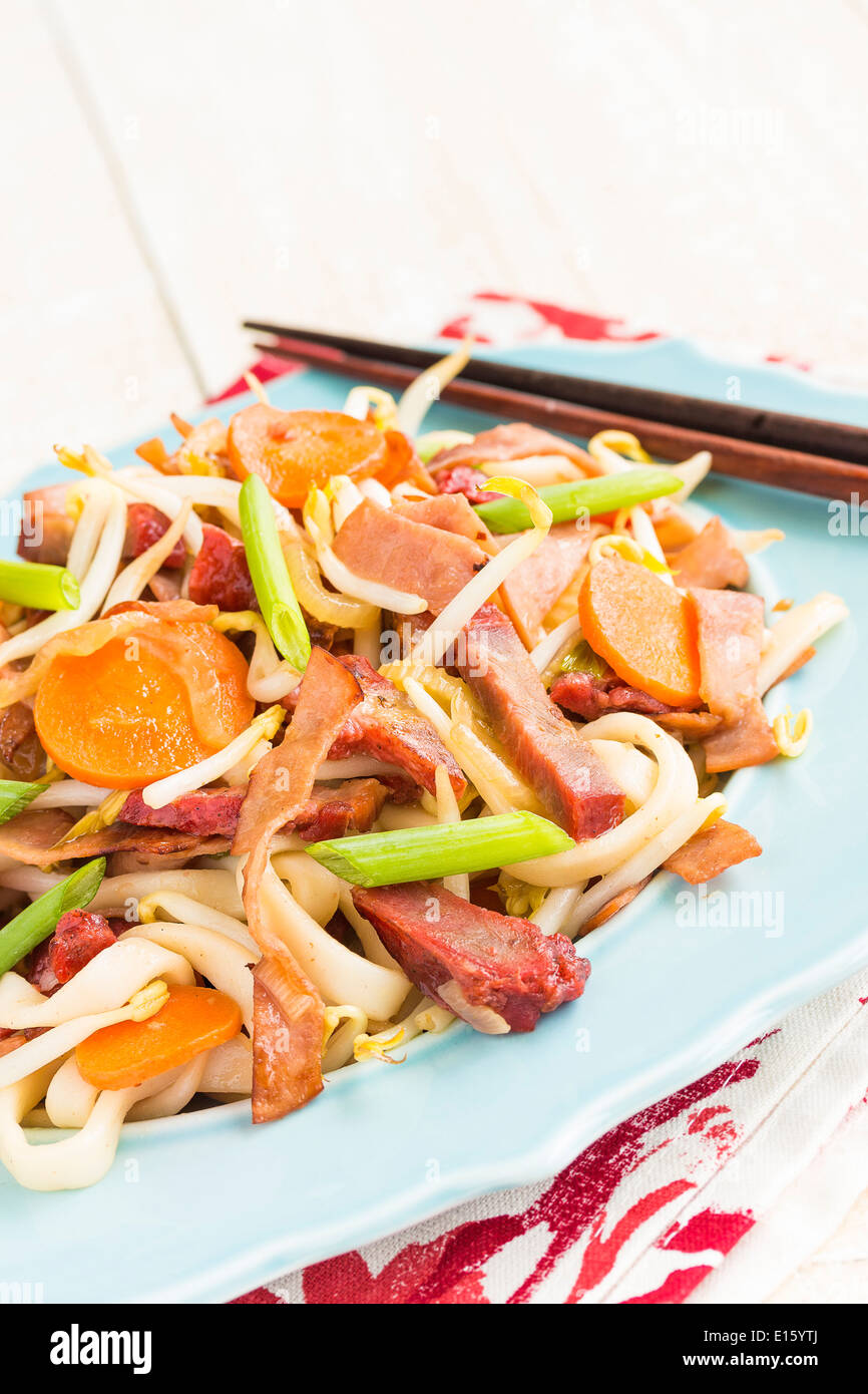 Chow Funn noodles with sauteed ham, char siu pork and vegetables Stock ...