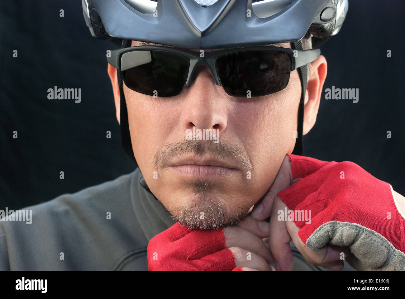 Putting on helmet hi-res stock photography and images - Alamy