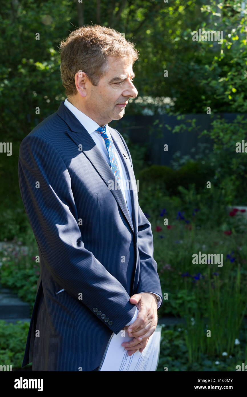 Rowan Atkinson attends the RHS Chelsea Flower Show to read a war poem ...