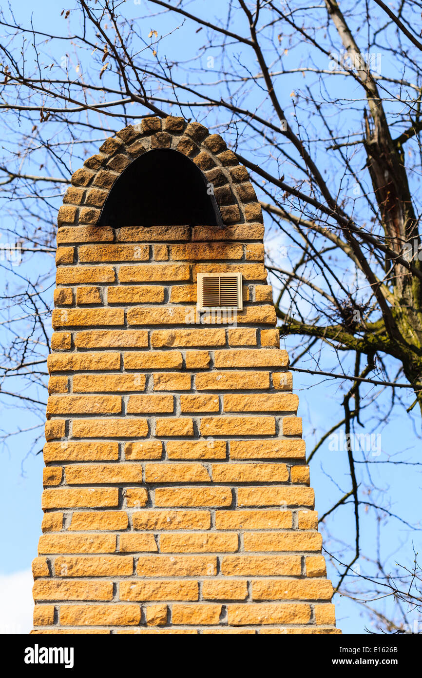 Architecture. Closeup of red brick chimney with ventilation exterior ...