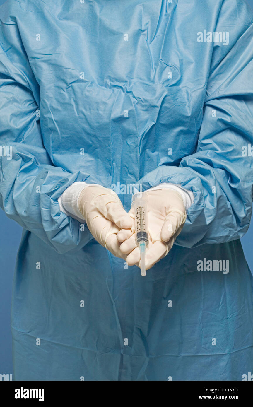 physician or nurse ready with injection Stock Photo - Alamy