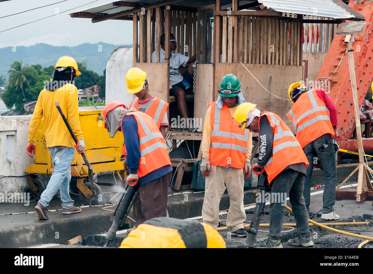 workmen on Magsaysay Bridge, Agusan river, Butuan, Philippines Stock ... workmen on Magsaysay Bridge, Agusan river, Butuan, Philippines Stock ...