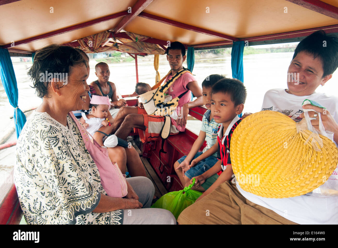 ferry passengers, Agusan river, Butuan, Philippines Stock Photo - Alamy ferry passengers, Agusan river, Butuan, Philippines Stock Photo - Alamy
