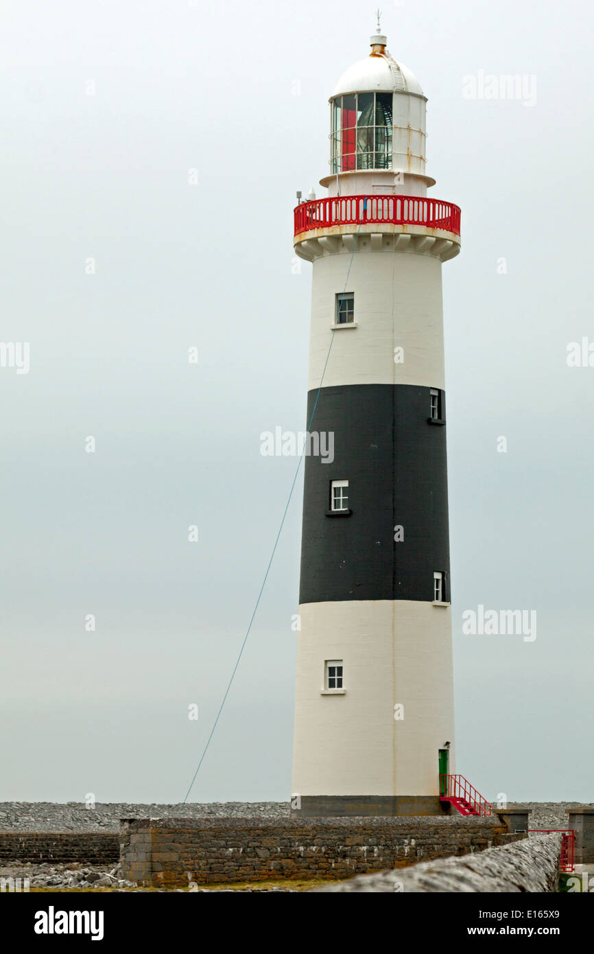 Inis Oirr or Inisheer lighthouse located on the southeastern point of ...