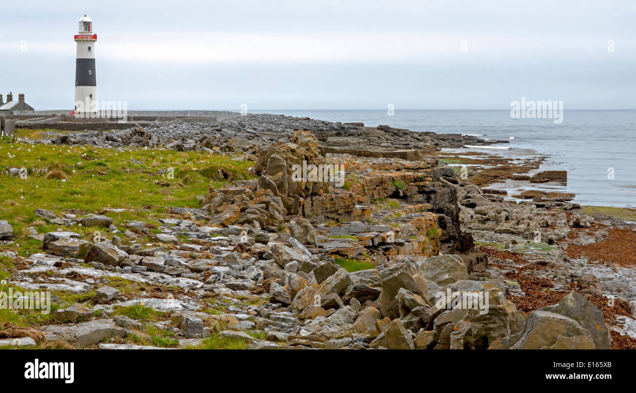 Inis Oirr or Inisheer lighthouse located on the southeastern point of ...